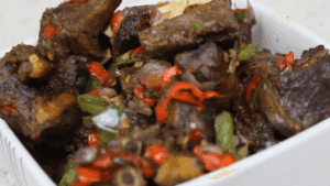 Authentic Nigerian Asun Recipe (Spicy Grilled Goat Meat) - Cooking Day